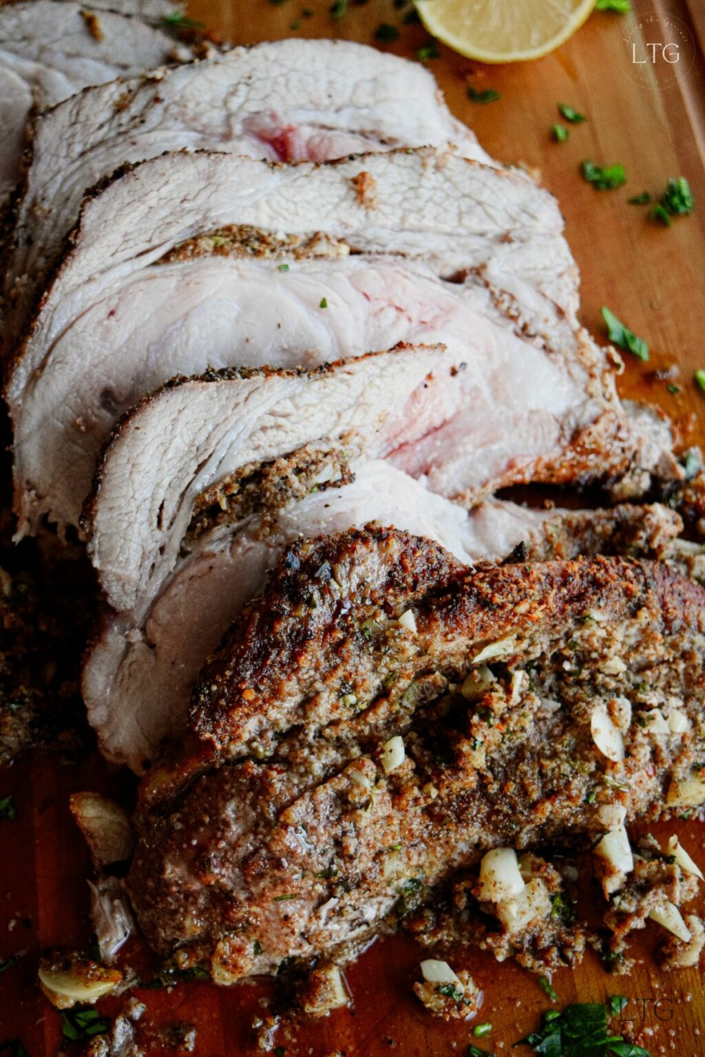 Garlic and Herb Stuffed Rib End Pork Roast - Living The Gourmet